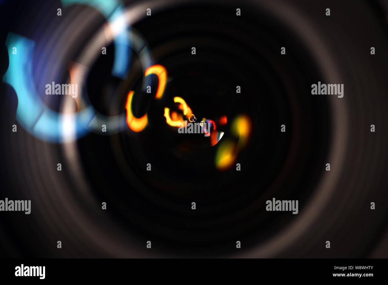 Cool background of light trails on a camera lens Stock Photo - Alamy