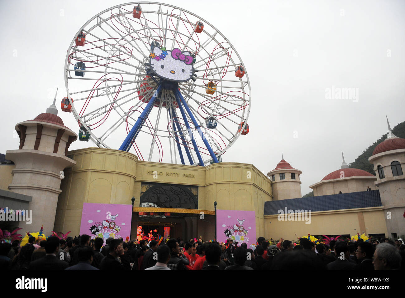 Visitors crowd in front of the Hello Kitty theme park during the ...