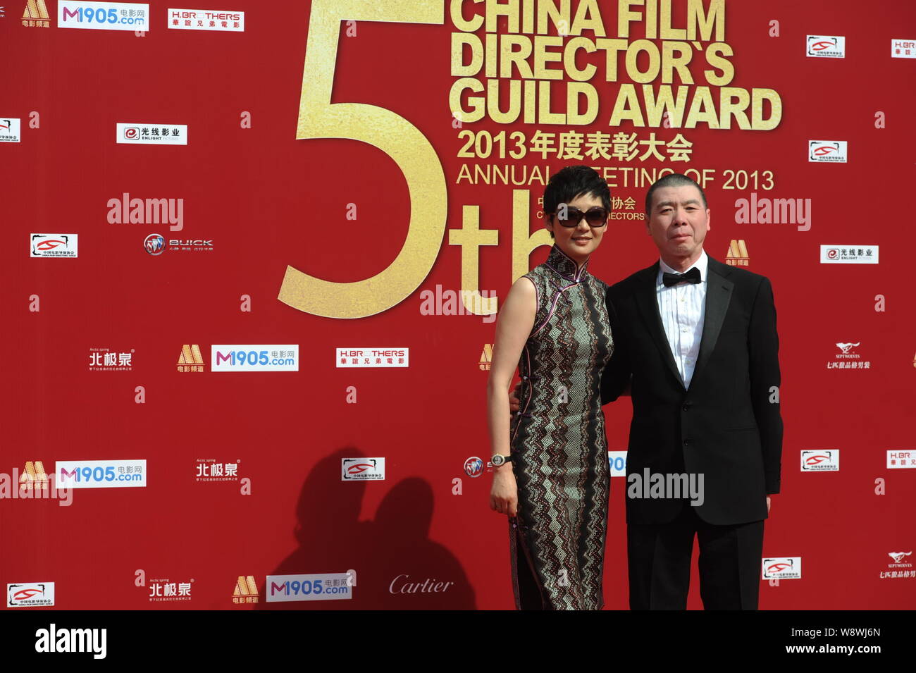 Chinese director Feng Xiaogang, right, and his actress wife Xu Fan pose ...