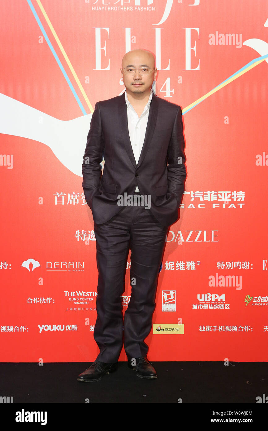 Chinese actor and director Xu Zheng poses as he arrives at the 2014 ...
