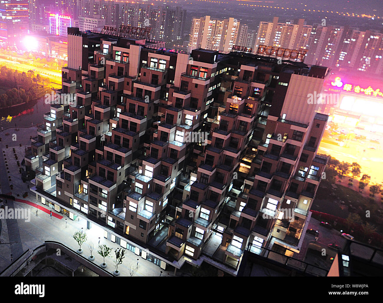 Night view of the Pyramid-shape office building in Kunshan city, east ...