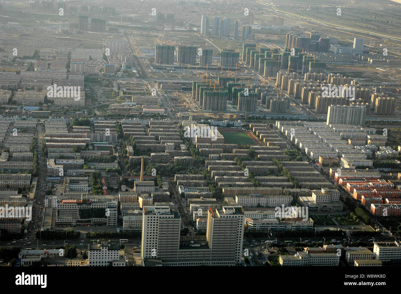 --FILE--Aerial view of residential houses and apartment buildings in ...