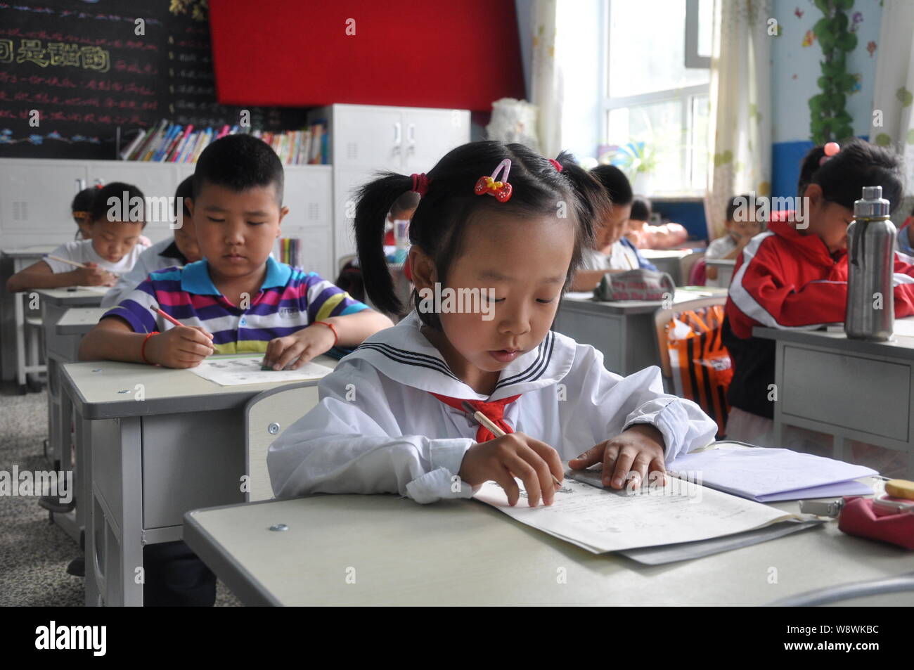 Chinese teacher secondary hi-res stock photography and images - Alamy