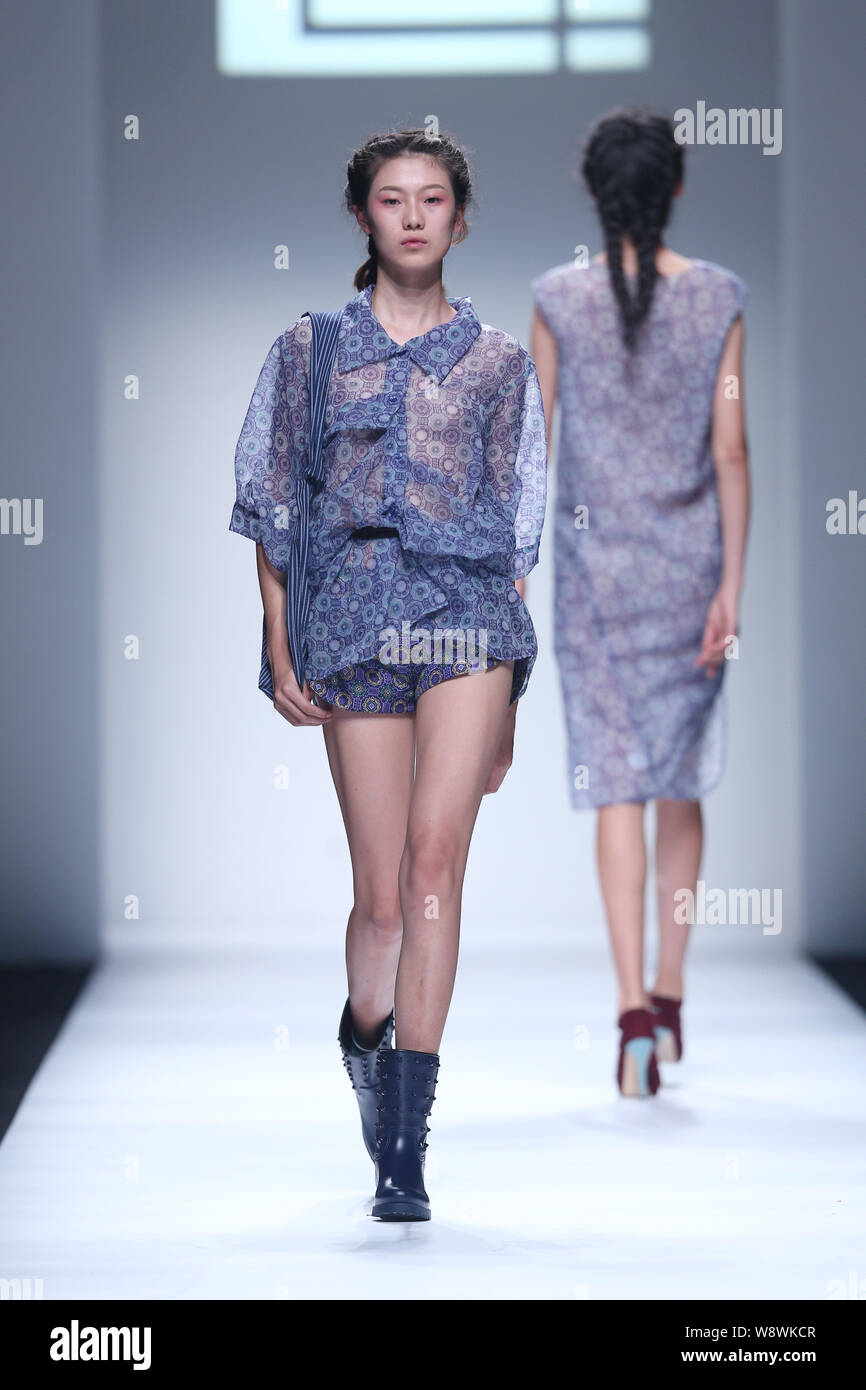 A model displays a new creation at the Moodbox fashion show during the ...