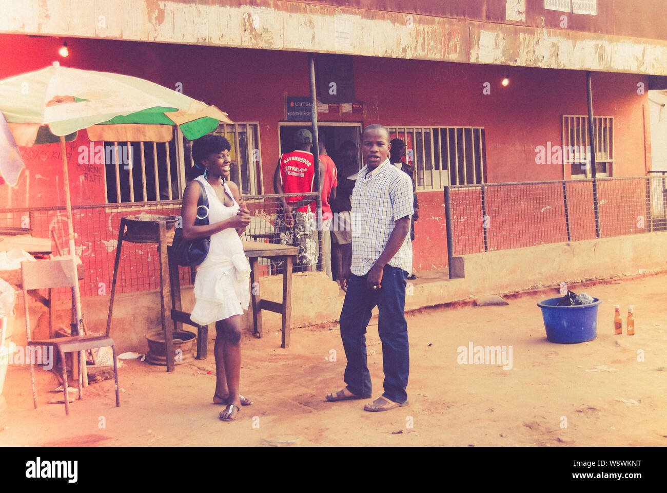 Young Angolan couple on a street of Angola capital city Luanda Stock ...