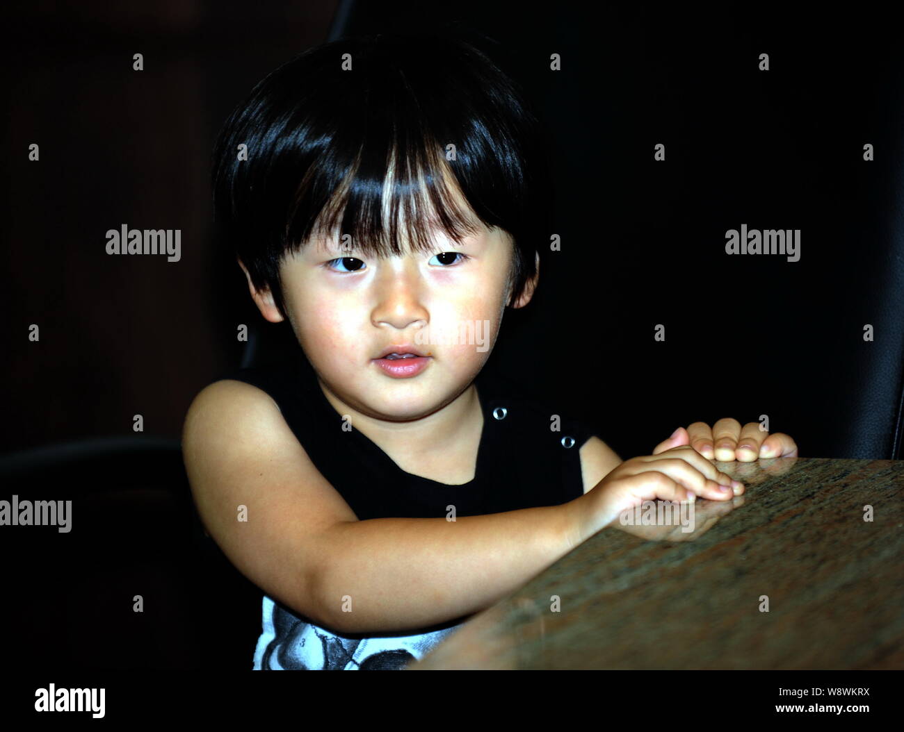 The son of Chinese boxer Zou Shiming is pictured at an interview ahead ...