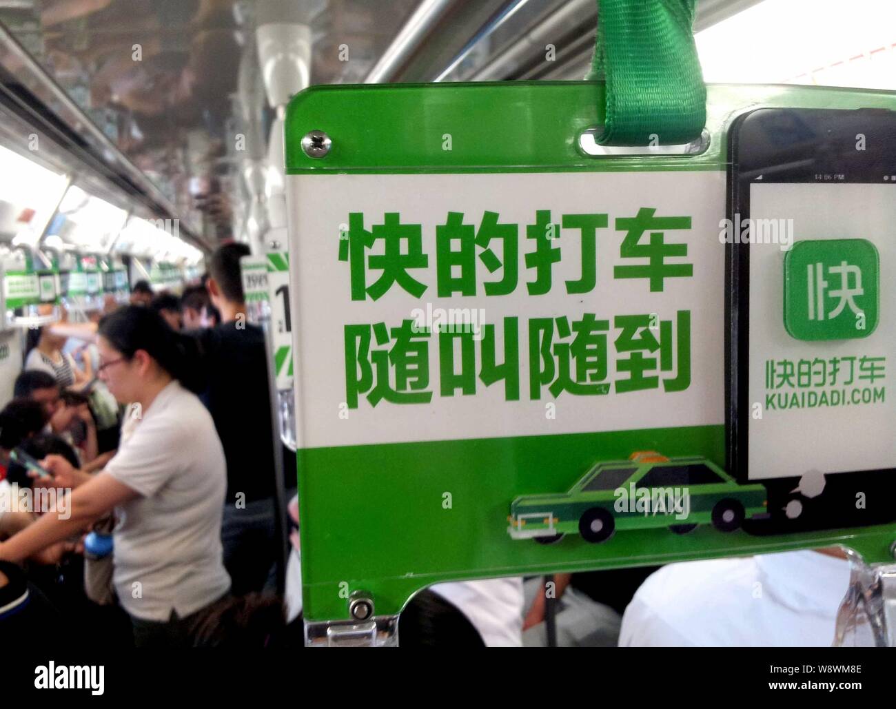 --FILE--View of an advertisement for taxi-hailing app Kuaidi Dache of ...