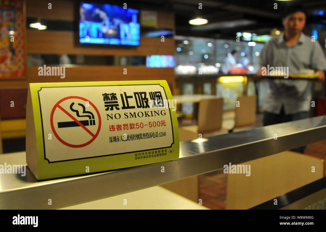 --FILE--A No Smoking sign is pictured at a restaurant in Shenzhen city ...