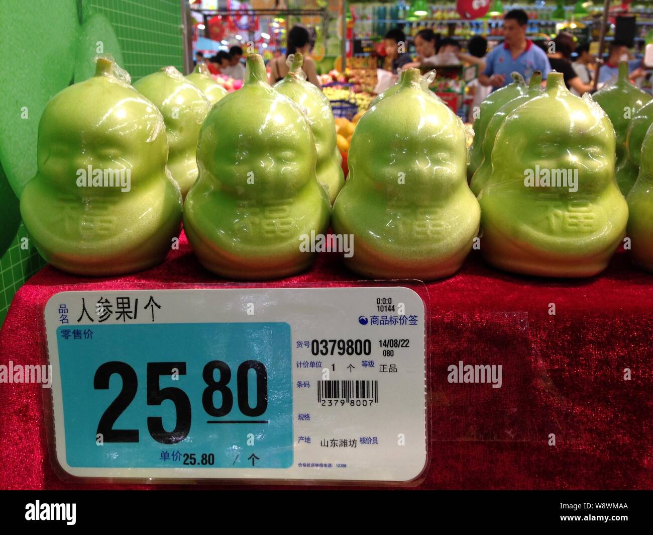 Buddha-shaped melons are for sale at a supermarket in Hangzhou city ...