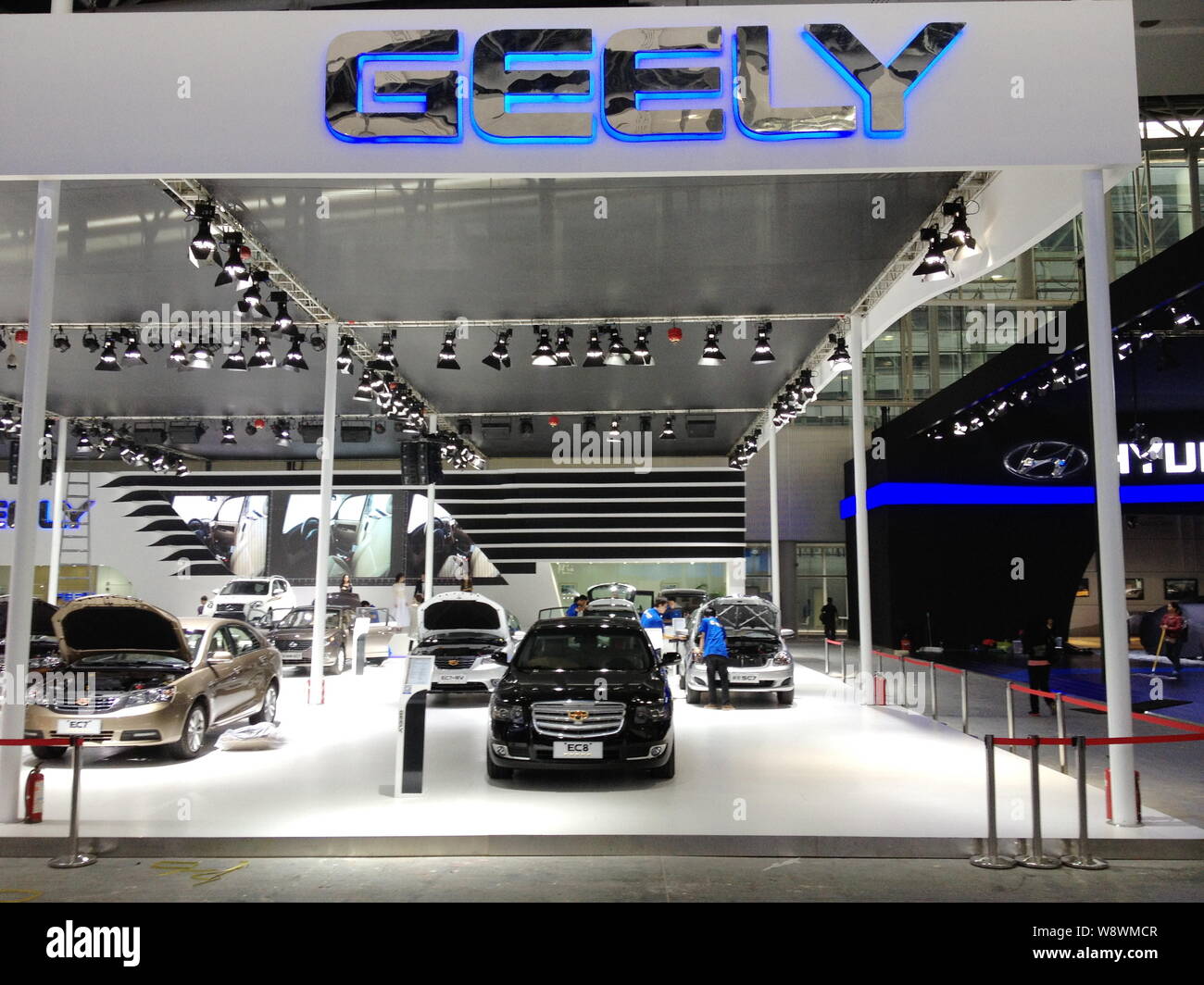 --FILE--Cars are displayed at the stand of Geely during the 11th China ...