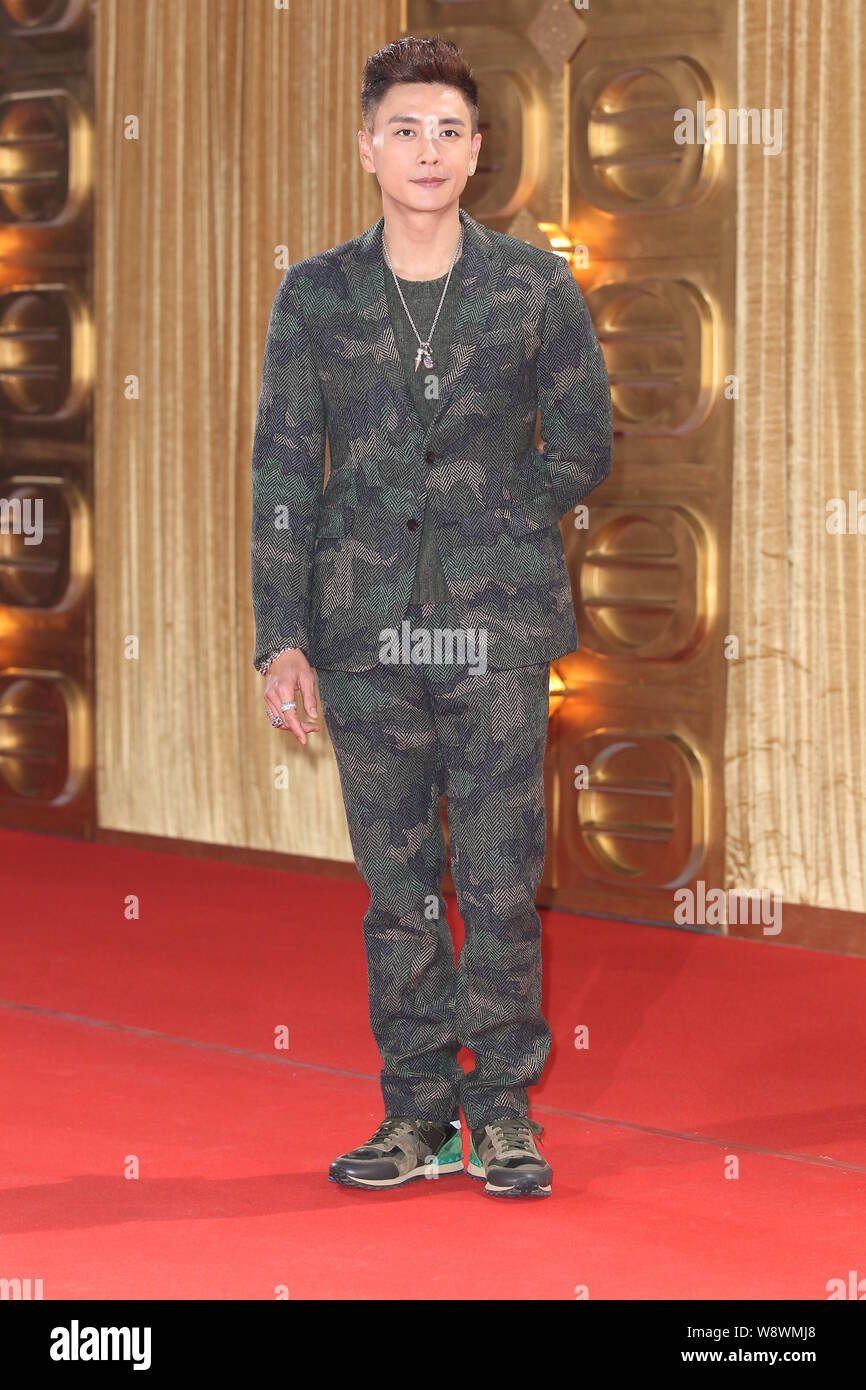 Hong Kong actor Bosco Wong poses on the red carpet for the 2014 TVB ...
