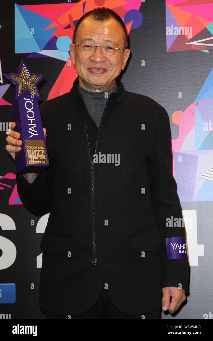 Hong Kong actor Benz Hui Shiu-hung poses with his trophy after the ...
