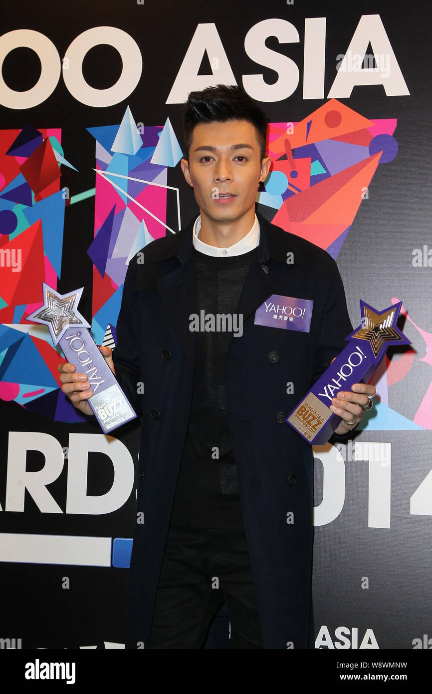 Hong Kong singer and actor Pakho Chau Pak-ho poses with his trophies ...