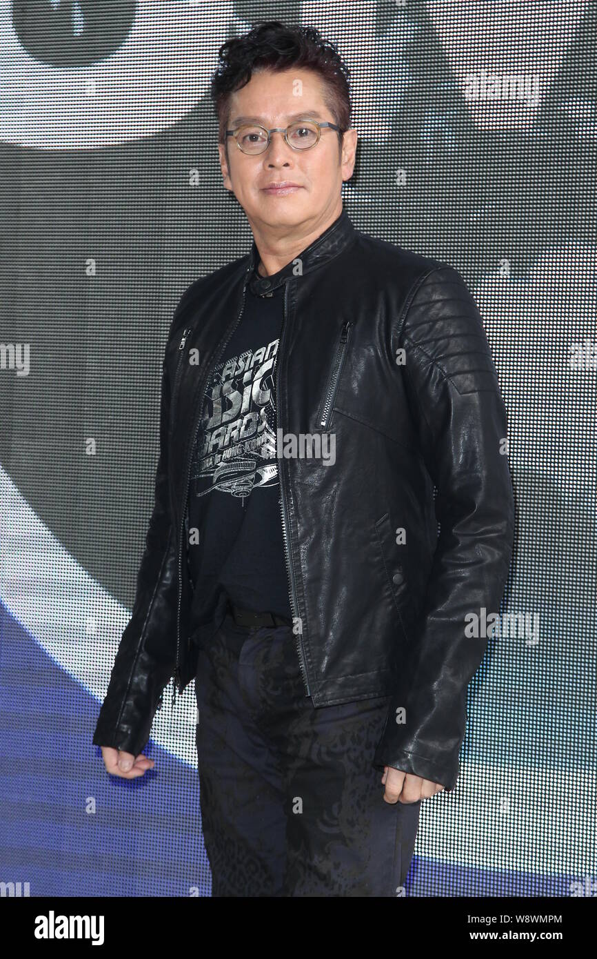Hong Kong singer Alan Tam poses at a promotional event for membership ...