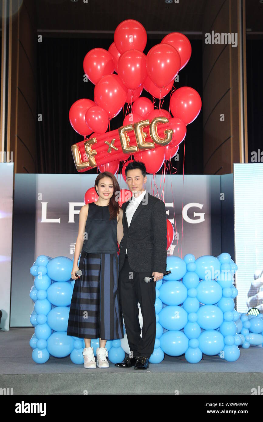 Hong Kong singer Joey Yung, left, poses with Hong Kong actor Raymond ...
