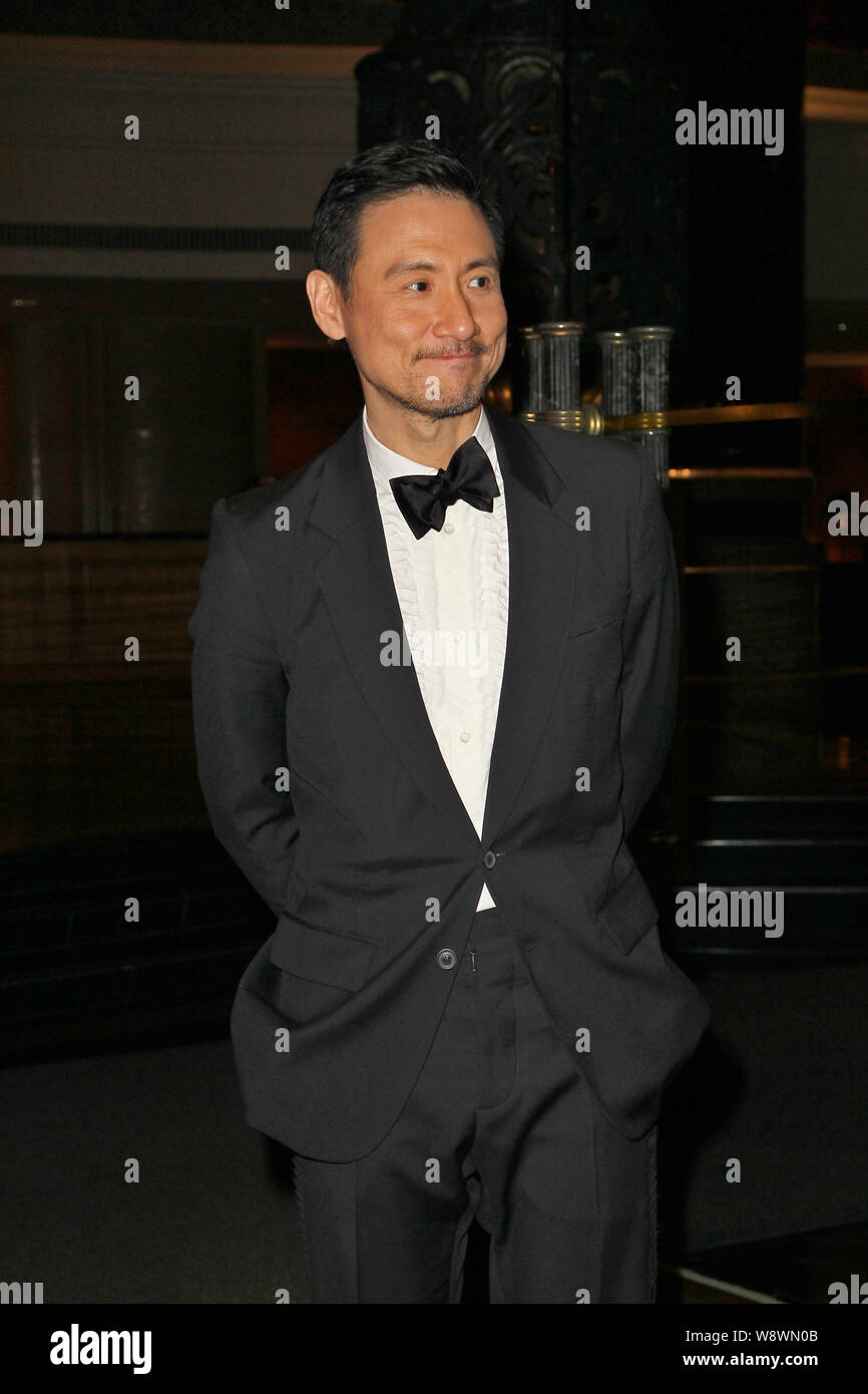 Hong Kong singer Jacky Cheung smiles as he arrives for Carina Lau's ...
