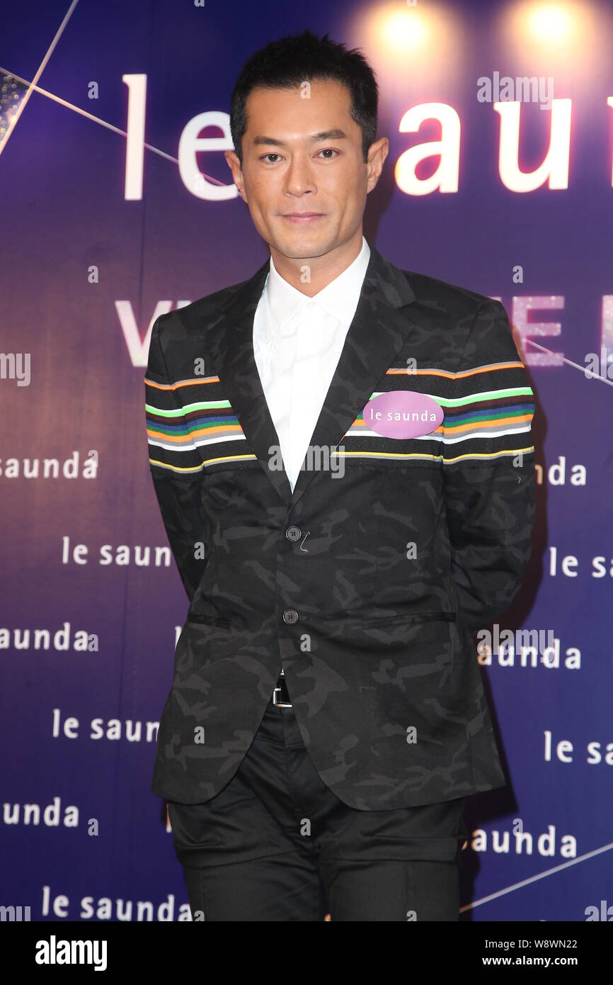 Hong Kong actor Louis Koo poses at a launch event for new collections ...