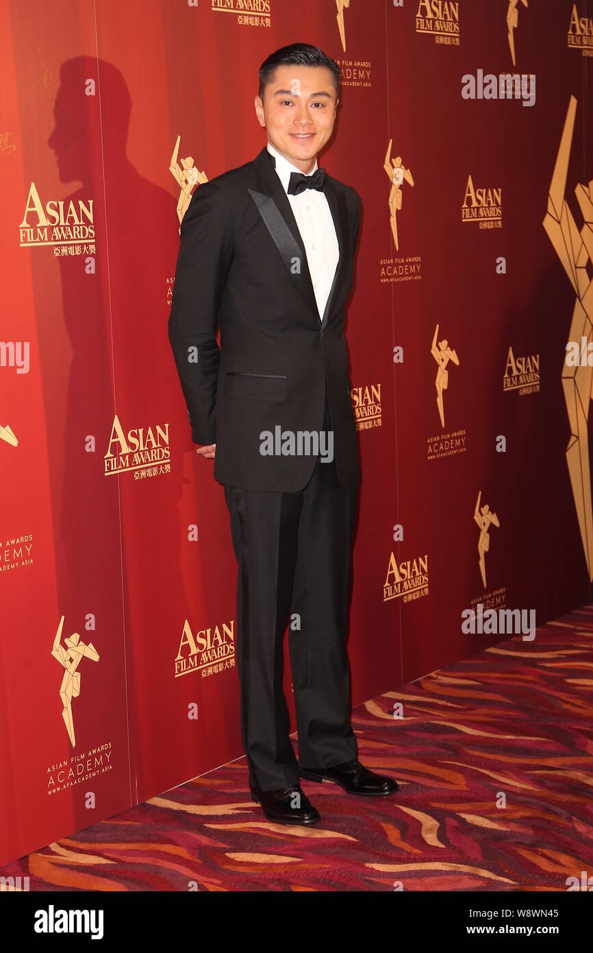 Hong Kong actor Raymond Wong poses as he arrives for the Asian Film ...
