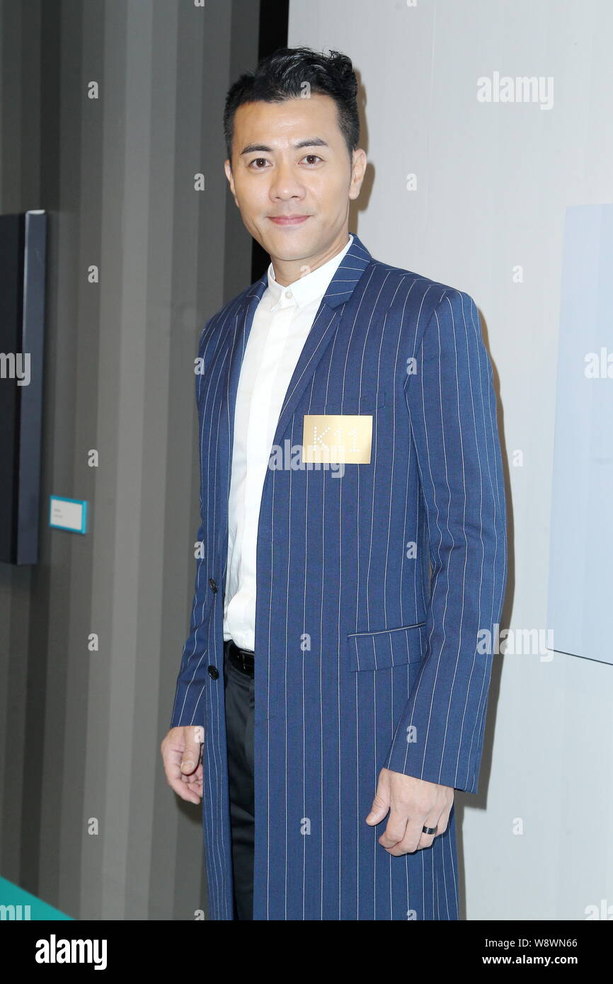 Hong Kong singer and actor Edmond Leung poses as he arrives for the ...