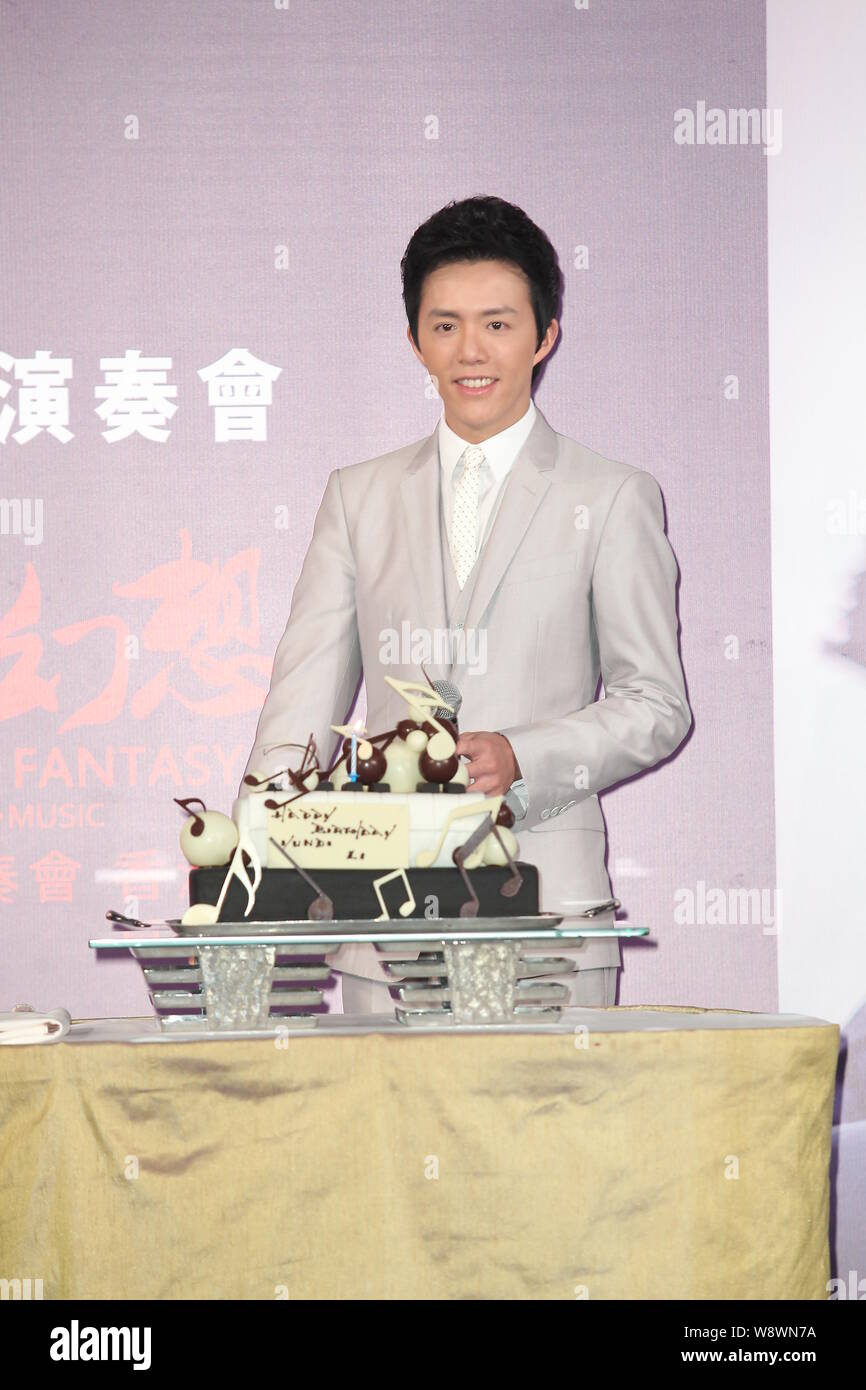 Chinese pianist Li Yundi poses during a press conference for his ...