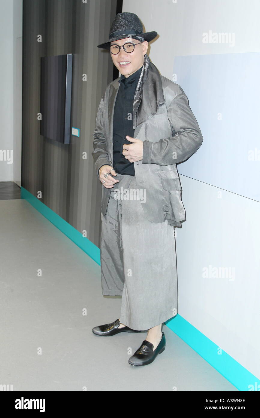 Hong Kong singer William So poses as he arrives for the opening ...