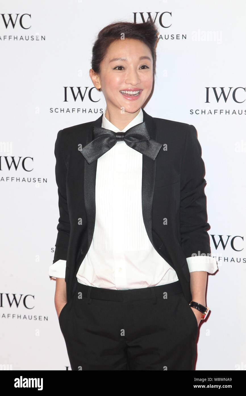Chinese actress Zhou Xun reacts on the red carpet as she arrives for ...