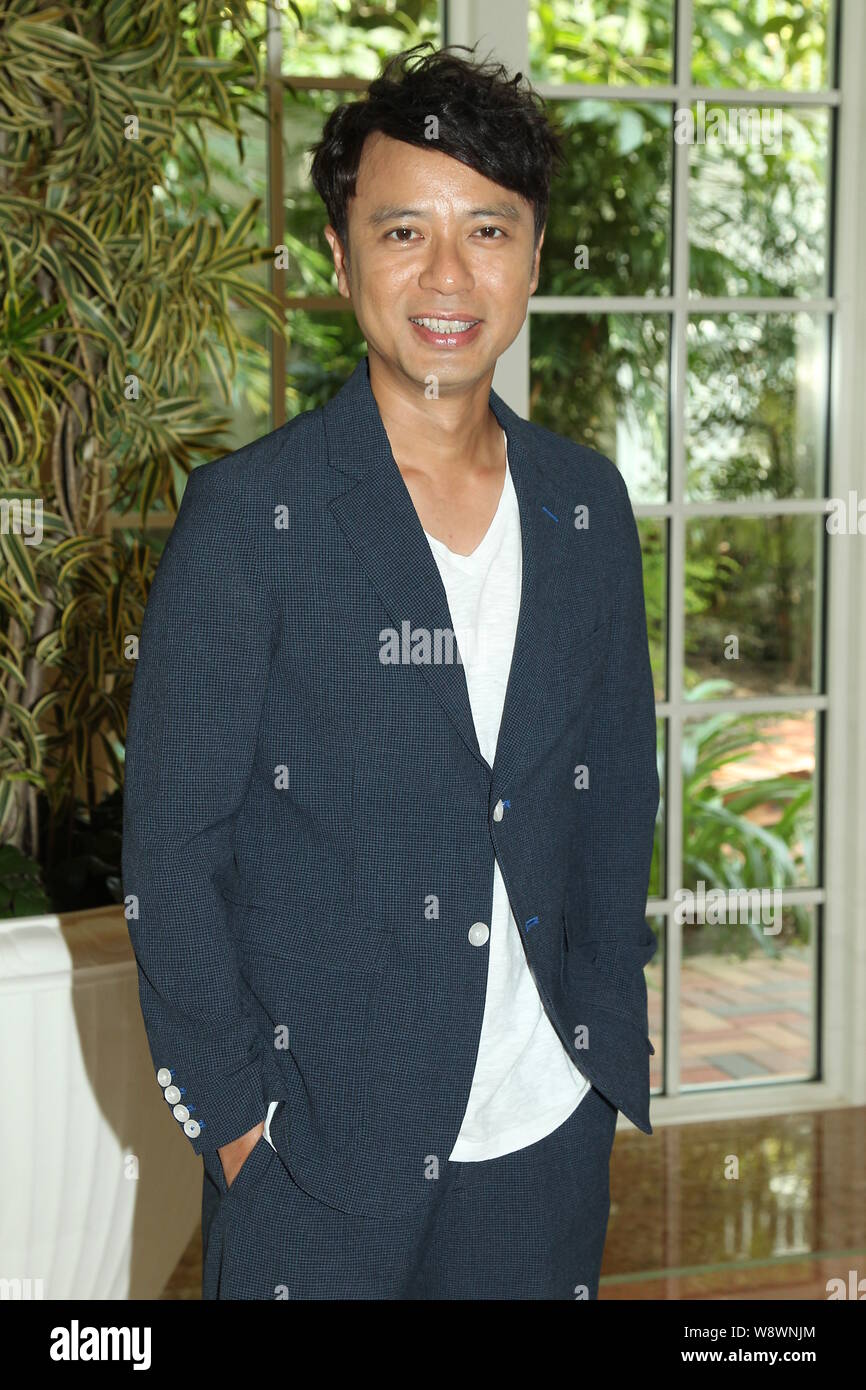 Hong Kong singer Hacken Lee poses at a press conference for the Disney ...