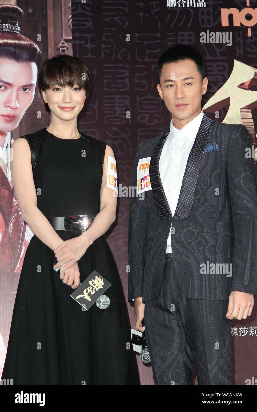 Hong Kong actor Raymond Lam, right, and Chinese actress Wang Luodan ...