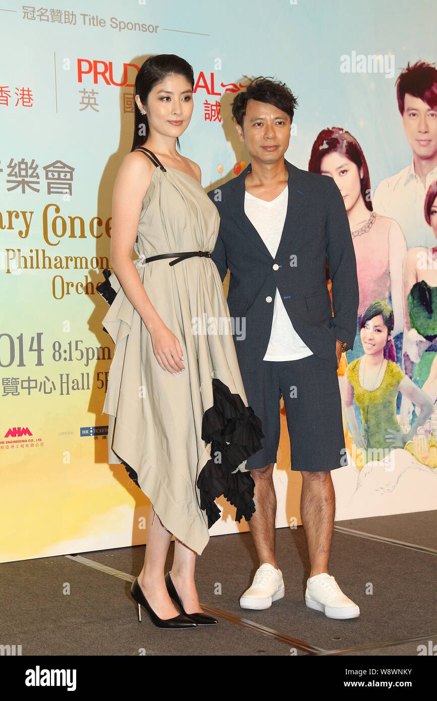 Hong Kong singers Kelly Chen, left, and Hacken Lee pose at a press ...