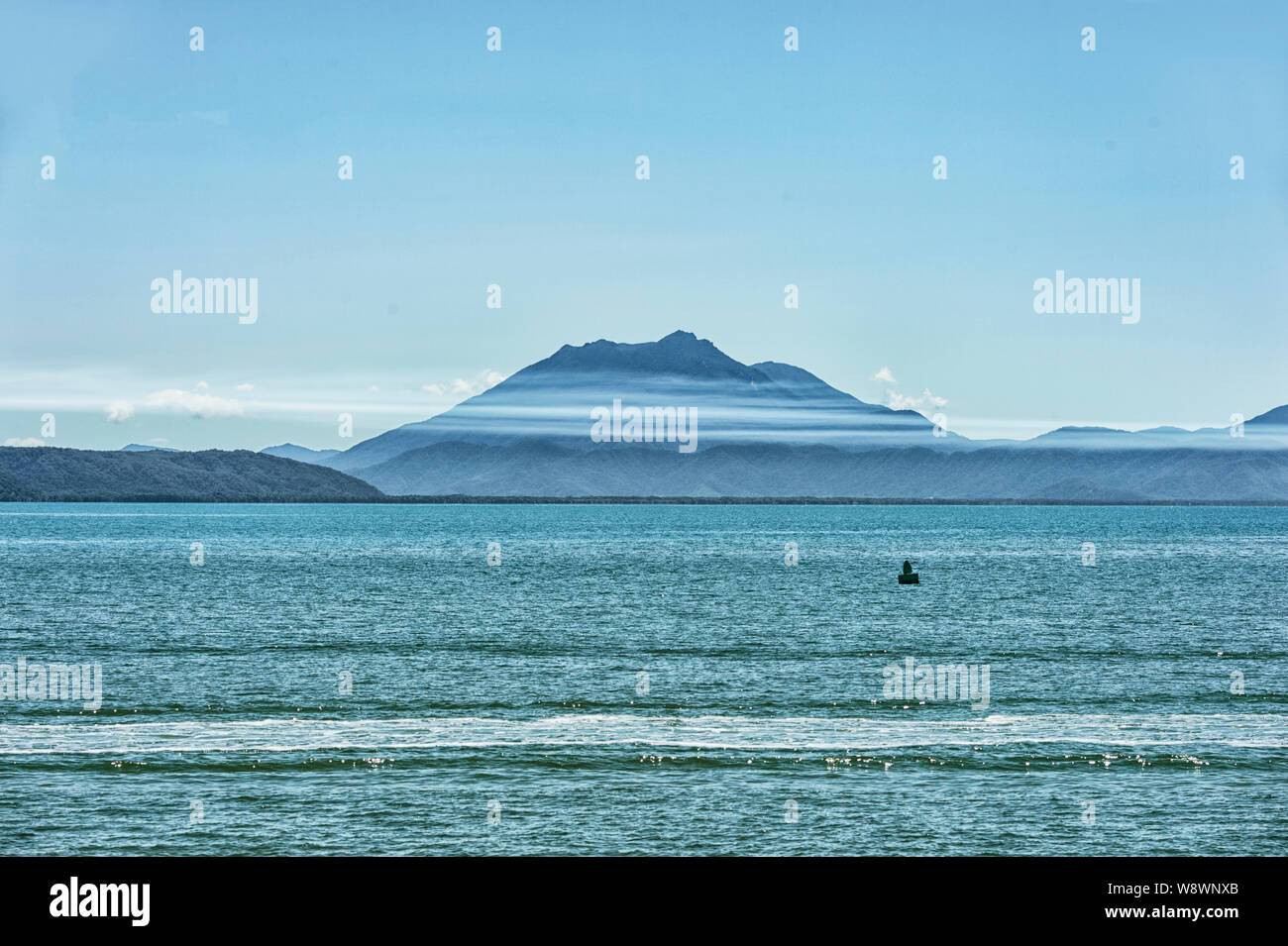 Blue stripey layers in the sea and peak in Port Douglas, Far North ...