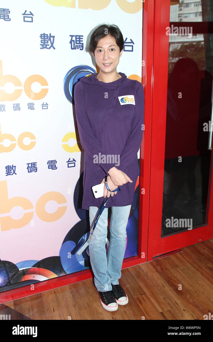Hong Kong actress and hostess Elaine Ng poses after a recording session ...