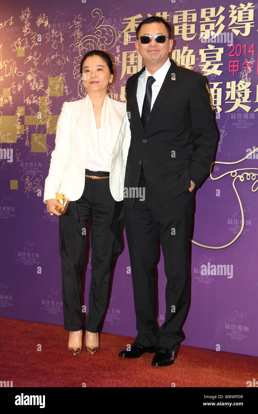 Hong Kong director Wong Kar-Wai, right, and his wife pose on the red ...