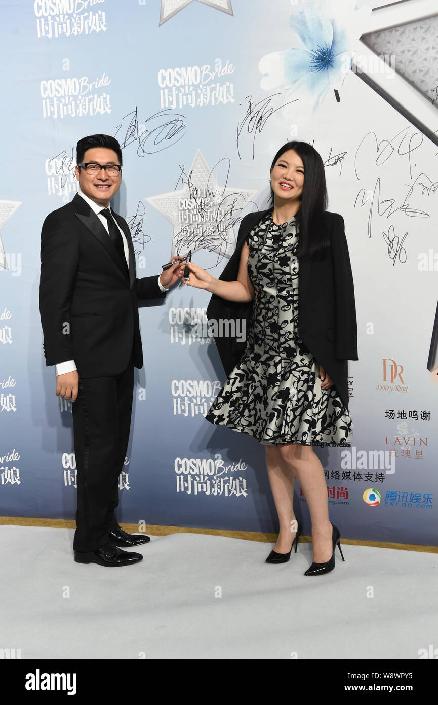 Chinese TV hostess Li Xiang, right, and her director husband Wang ...
