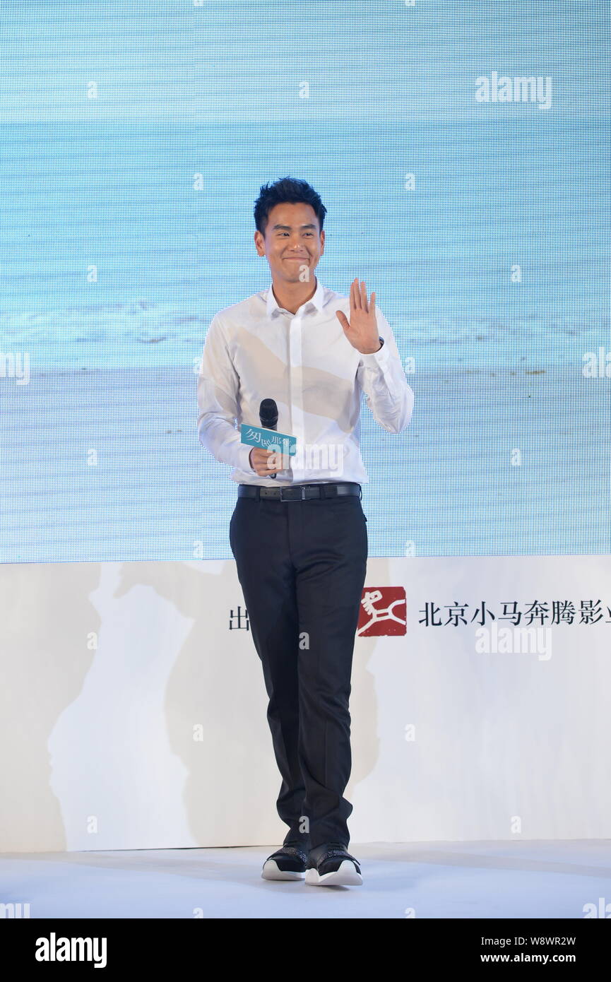 Taiwanese actor Eddie Peng waves during a press conference for his ...