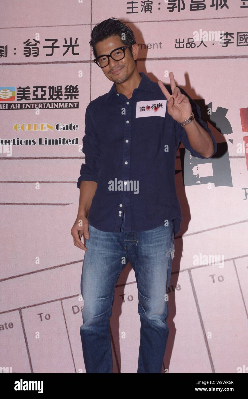 Hong Kong singer and actor Aaron Kwok poses during a press conference for his new movie "Port of ...