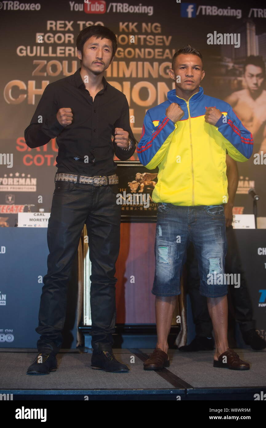 Chinese boxer Zou Shiming, left, and Colombian boxer Luis De La Rosa ...