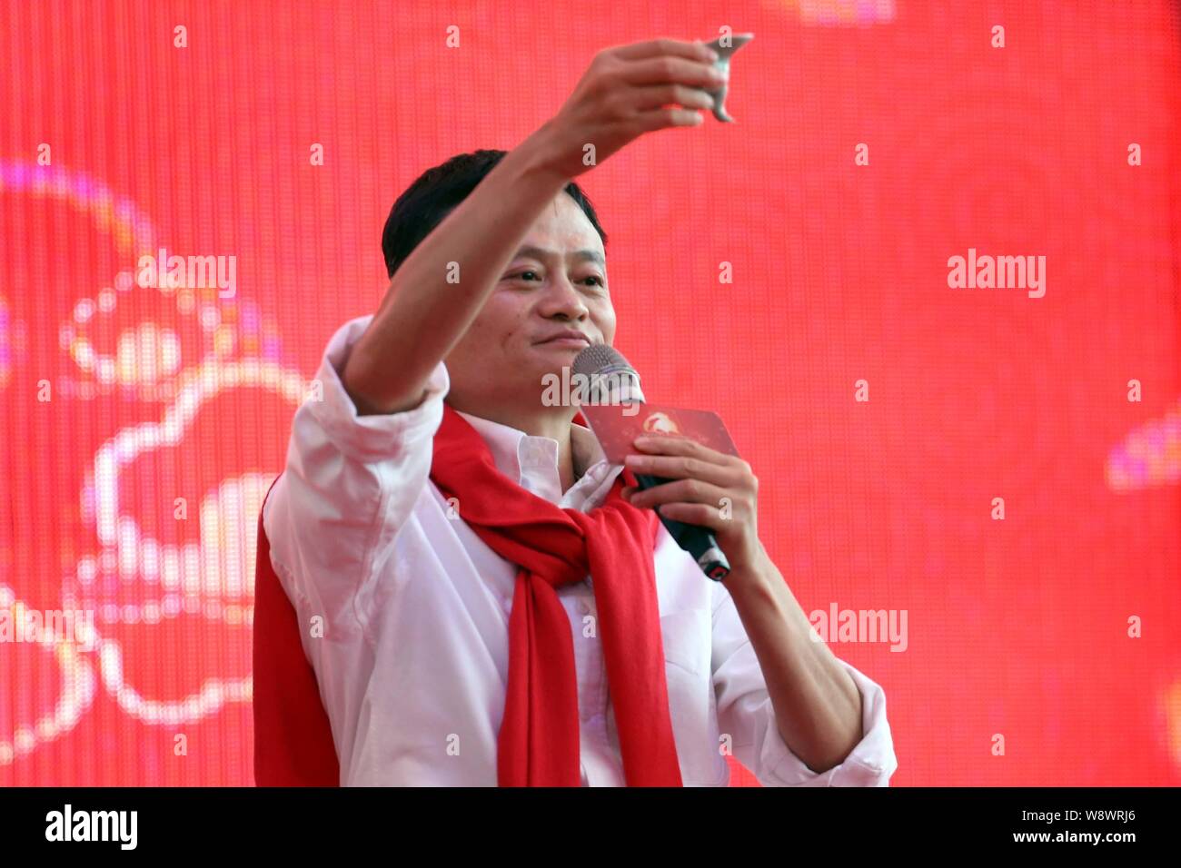 Jack Ma Yun, Chairman of Alibaba Group, toasts during a group wedding ...