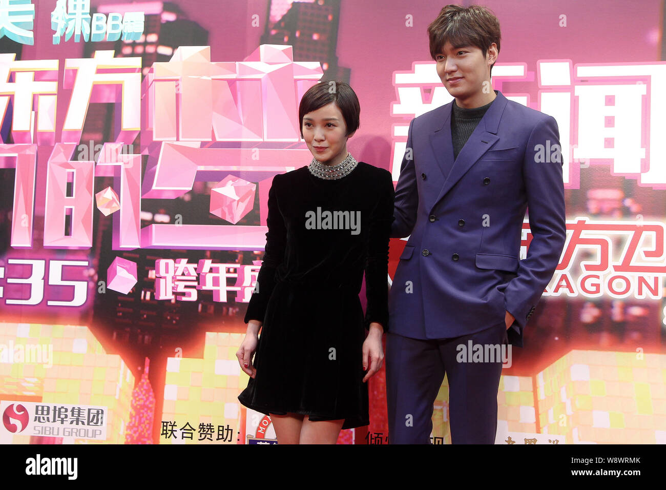 Taiwanese actress Amber Kuo, left, and South Korean actor Lee Min-ho ...