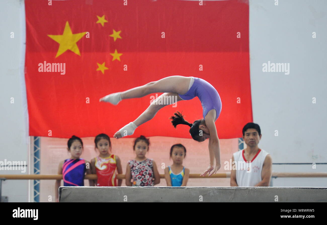 On a gymnastic beam hi-res stock photography and images - Alamy