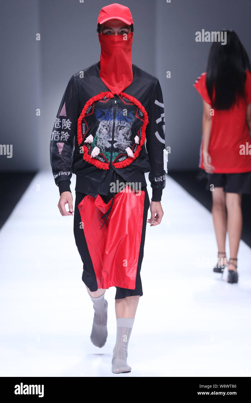 A model displays a new creation at the VDS in shanghai fashion show ...