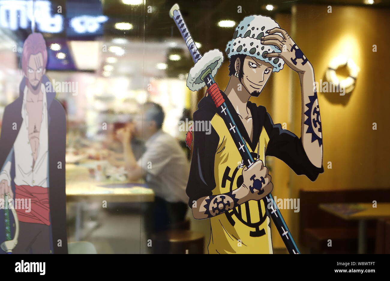 Customers eat at the One Piece-themed McDonalds fastfood restaurant in ...