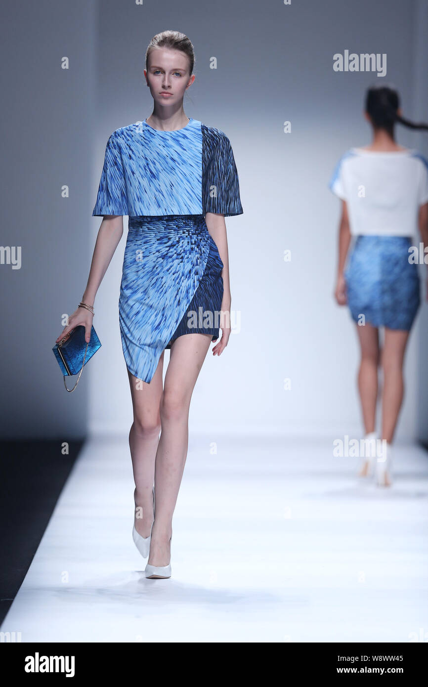 A model displays a new creation at The New Classic fashion show during ...