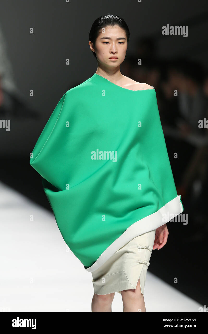 A model displays a new creation at the Jess Zhao fashion show during ...