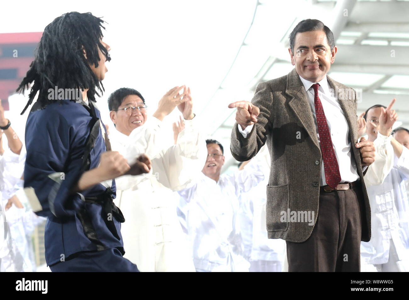English actor Rowan Atkinson, right, plays Mr. Bean during a filming ...