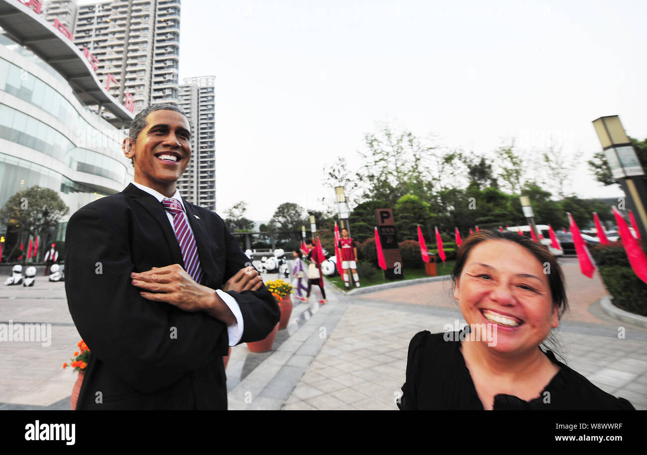 Chinese figure walks hi-res stock photography and images - Alamy