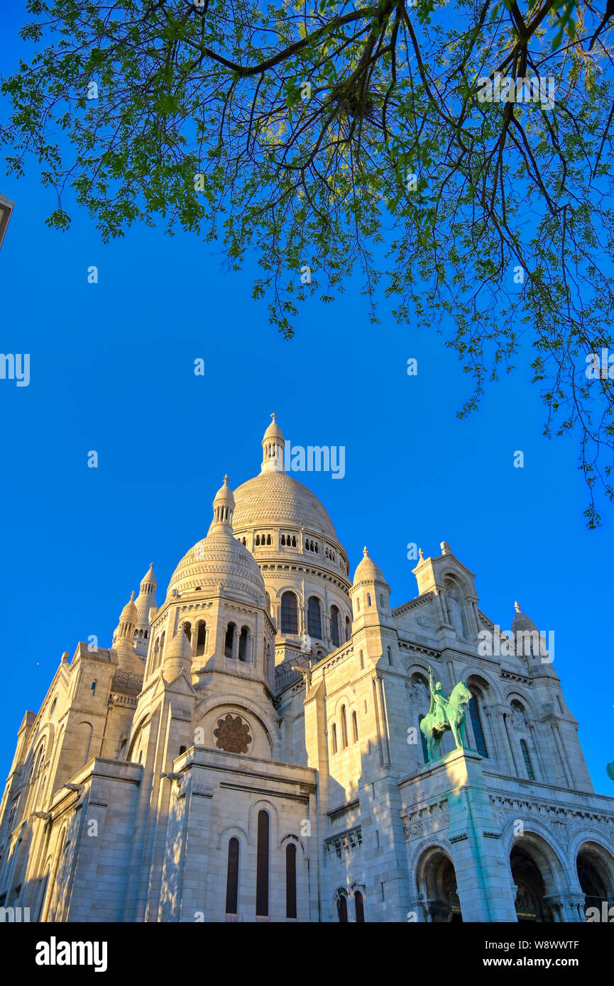 The Basilica of the Sacred Heart of Paris, located in the Montmartre ...