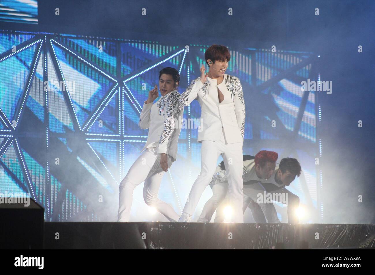 Members of South Korean boy group TVXQ perform at the concert of the ...