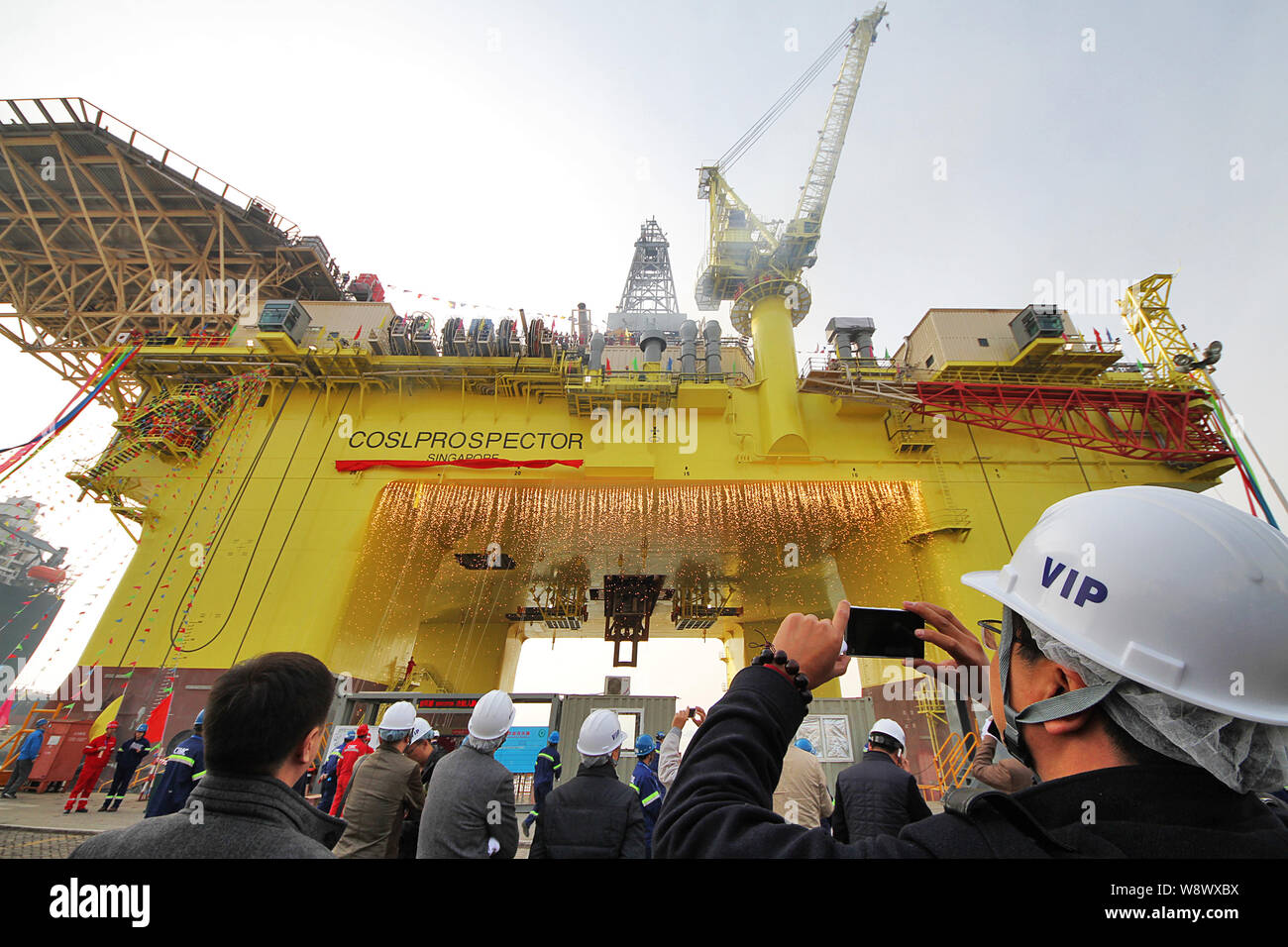 A VIP takes photos of the deepwater oil rig "COSLProspector" made for ...