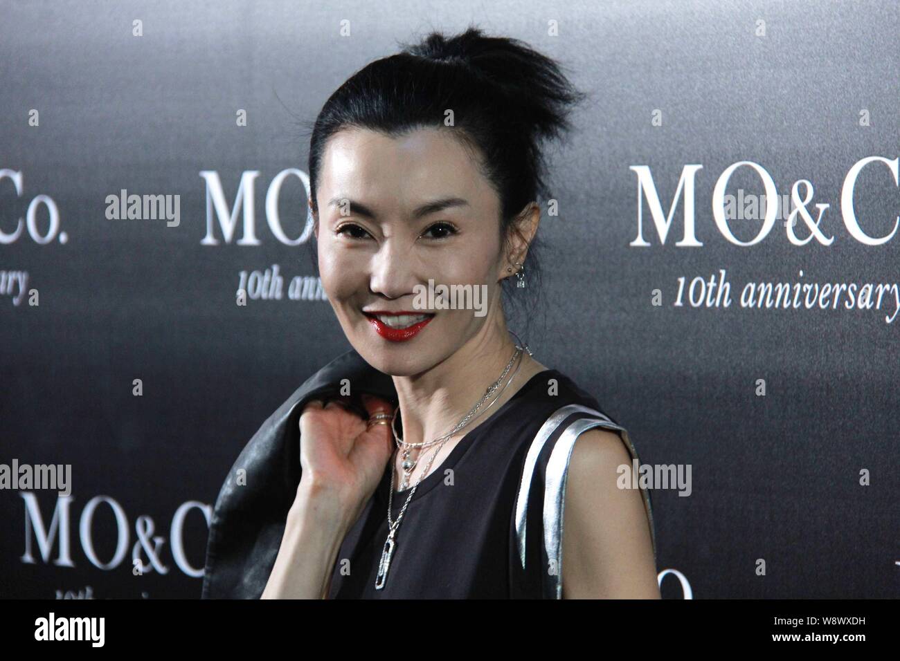 Hong Kong actress Maggie Cheung poses at a fashion event for the 10th ...