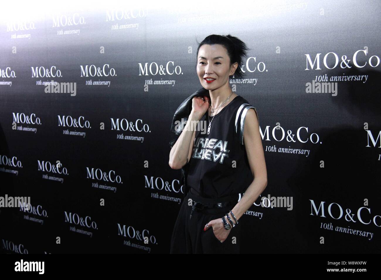 Hong Kong actress Maggie Cheung poses at a fashion event for the 10th ...